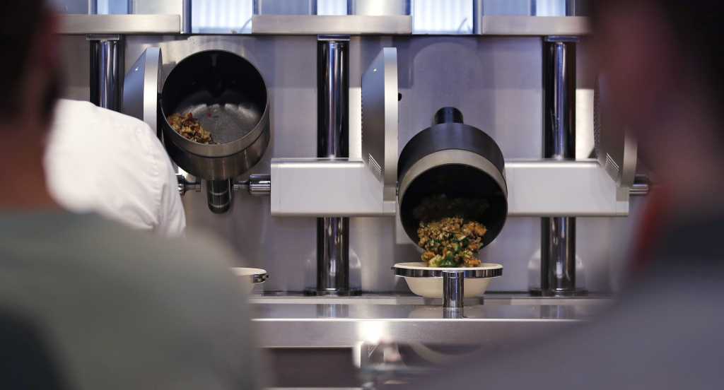 Robotic Woks Serves Food To Customers At Boston Restaurant